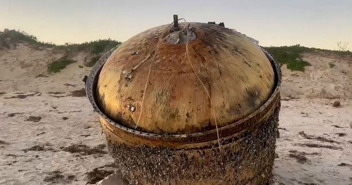 Mysterious object washes up on beach as cops 'cannot confirm' army ...
